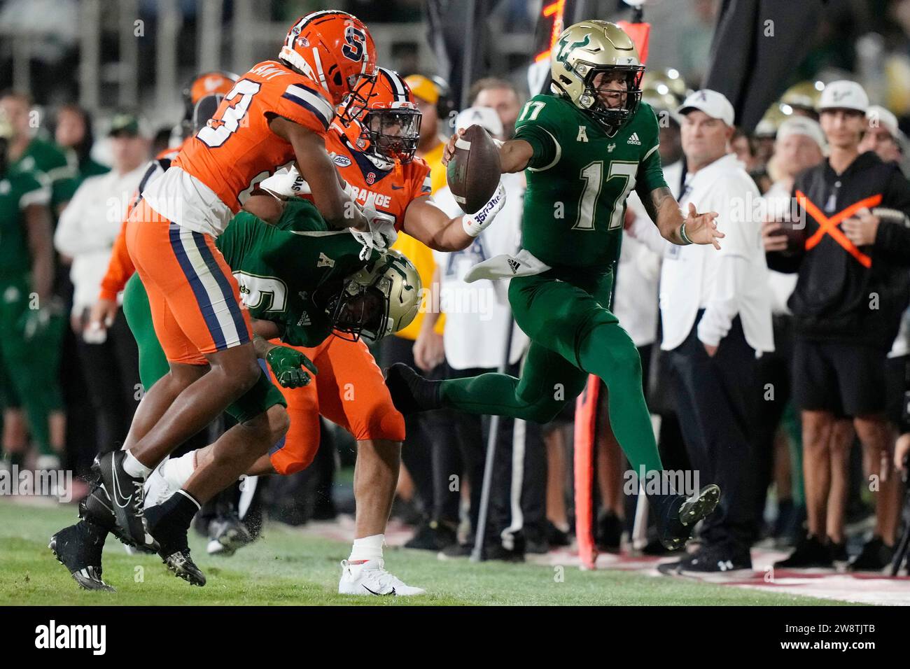 South Florida quarterback Byrum Brown (17) runs as Syracuse defensive ...