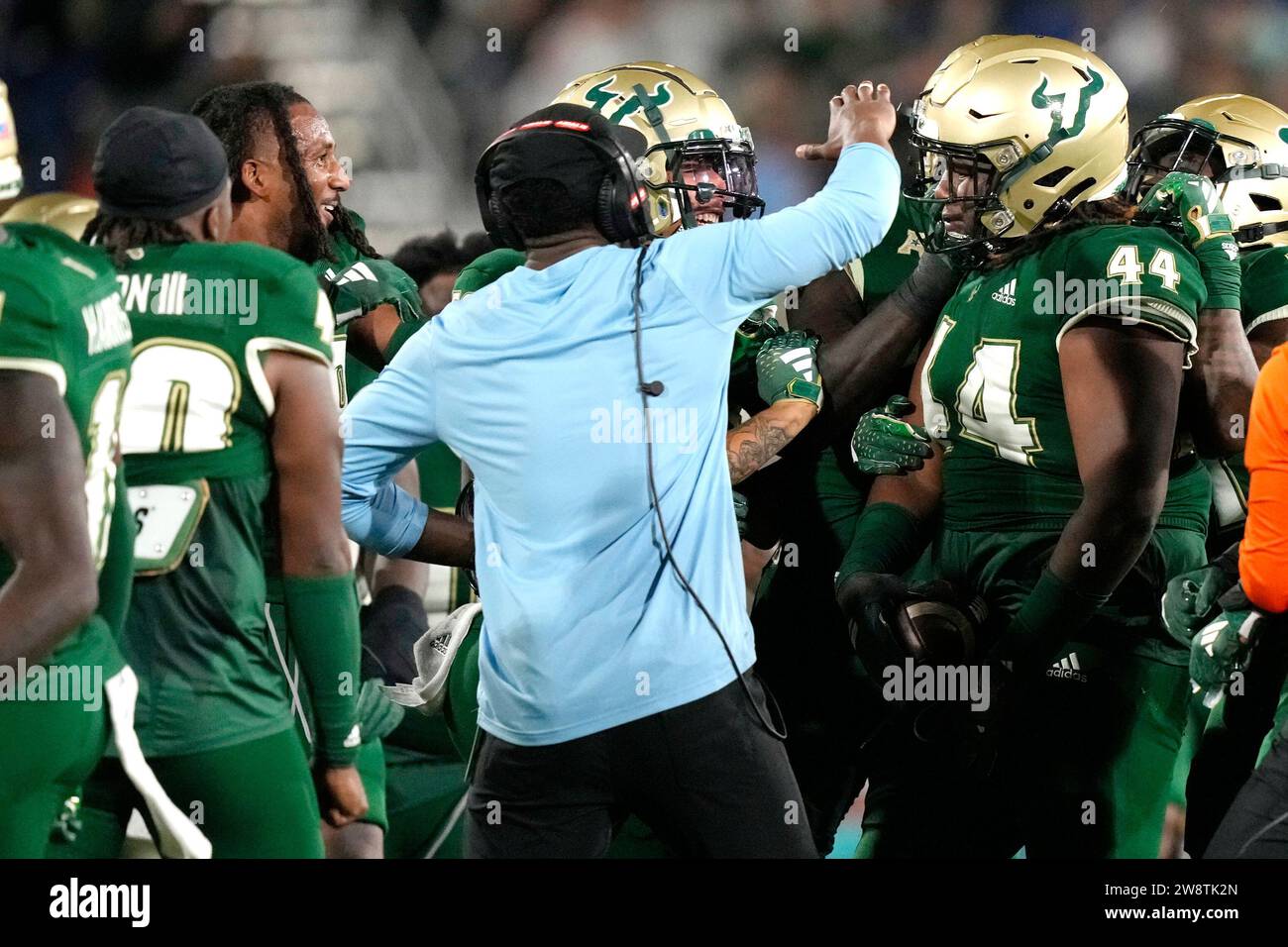 South Florida defensive lineman Jacquez Williams (44) is congratulated ...
