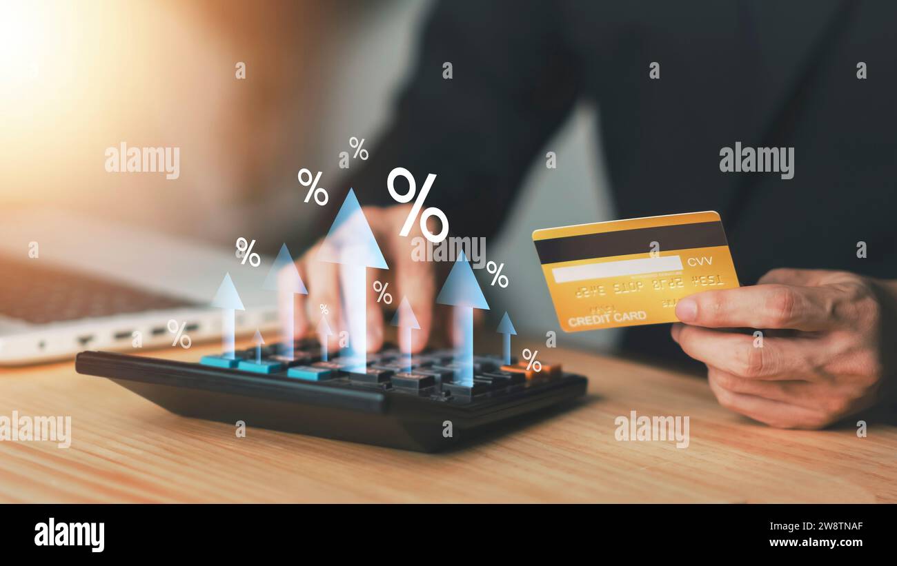 Credit card debts. Businessman calculating with calculator. Businessman ...