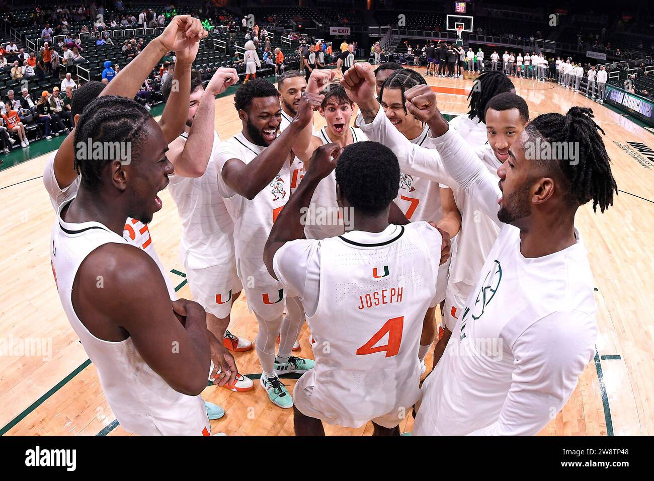 CORAL GABLES, FL - DECEMBER 21: Miami's team gathers on the court prior ...