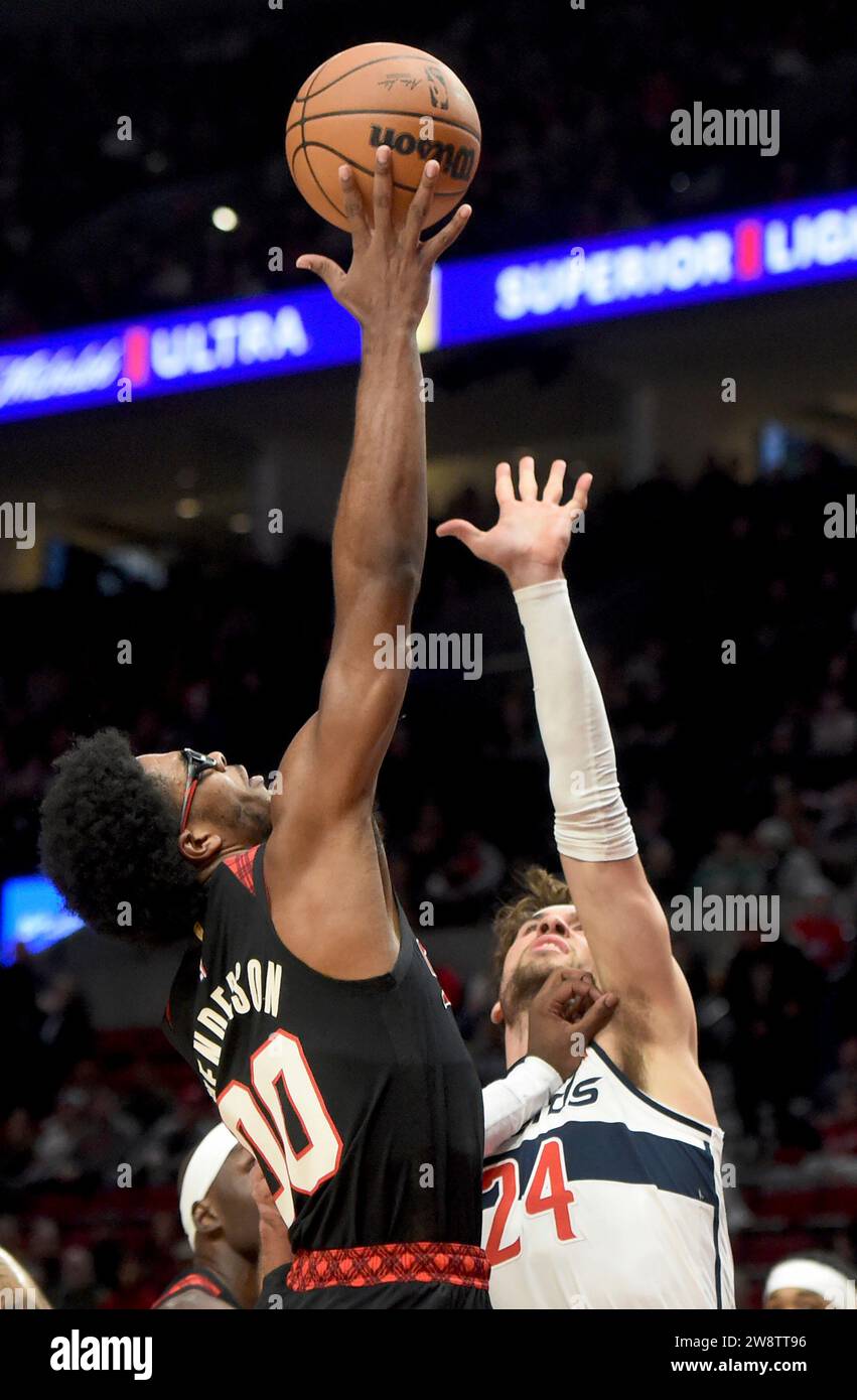 Portland Trail Blazers guard Scoot Henderson, left, drives to the ...