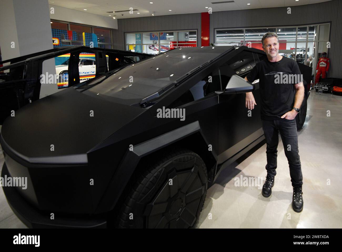 Tesla Chief Designer Franz von Holzhausen smiles as he poses for photos ...