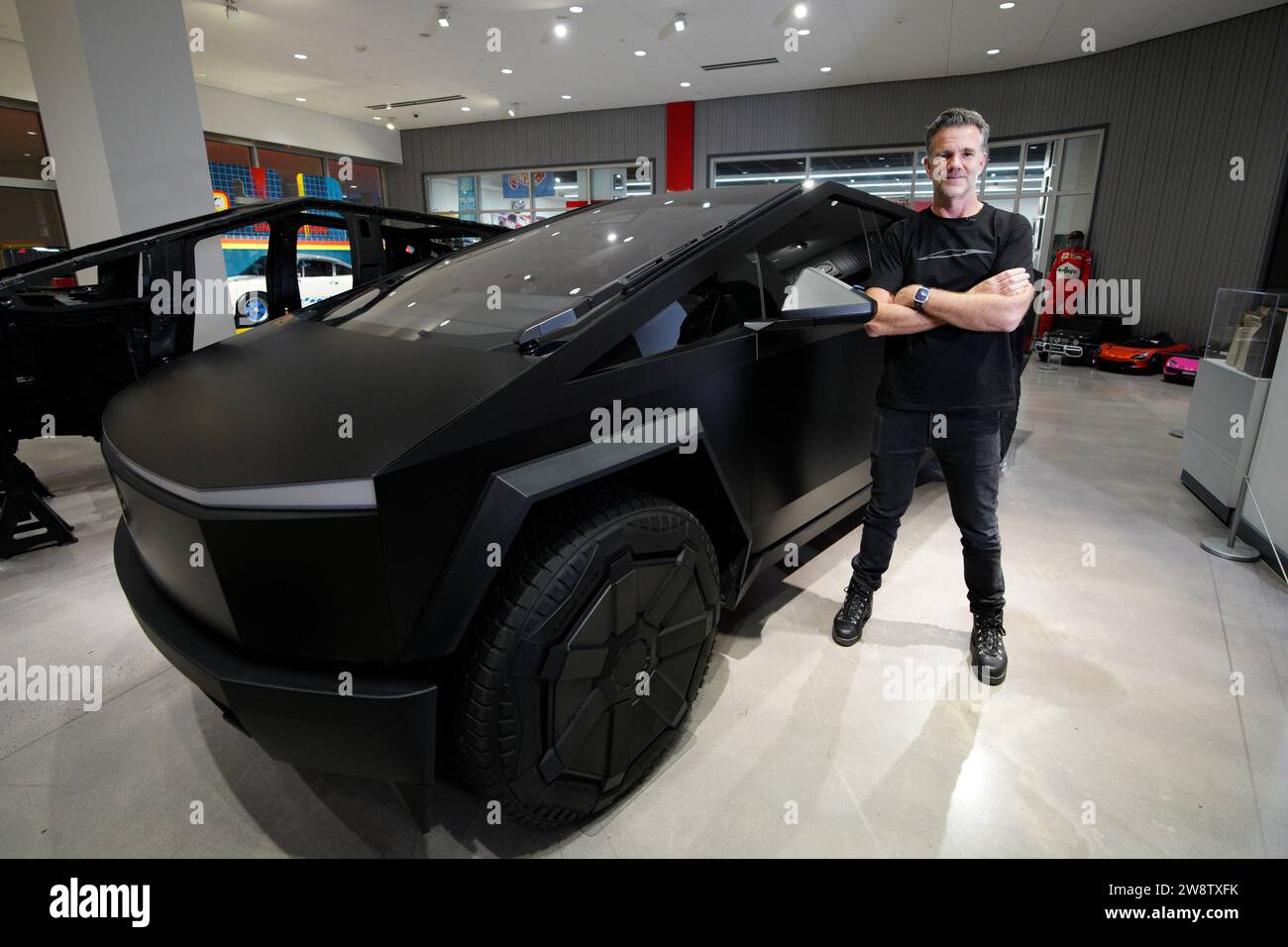 Tesla Chief Designer Franz von Holzhausen poses for photos in front of ...