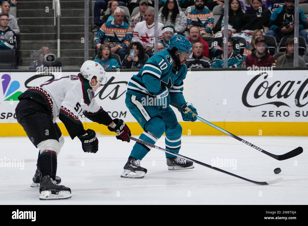 San Jose Sharks left wing Anthony Duclair (10) moves the puck while ...