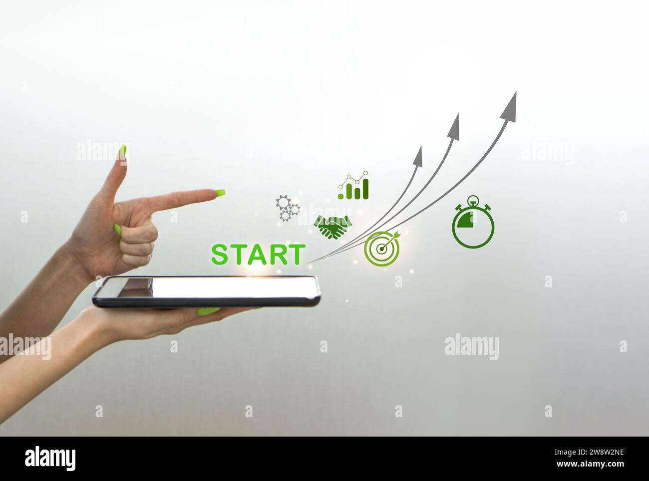 Closeup woman hand pointing at a tablet computer. Startup concept with ...