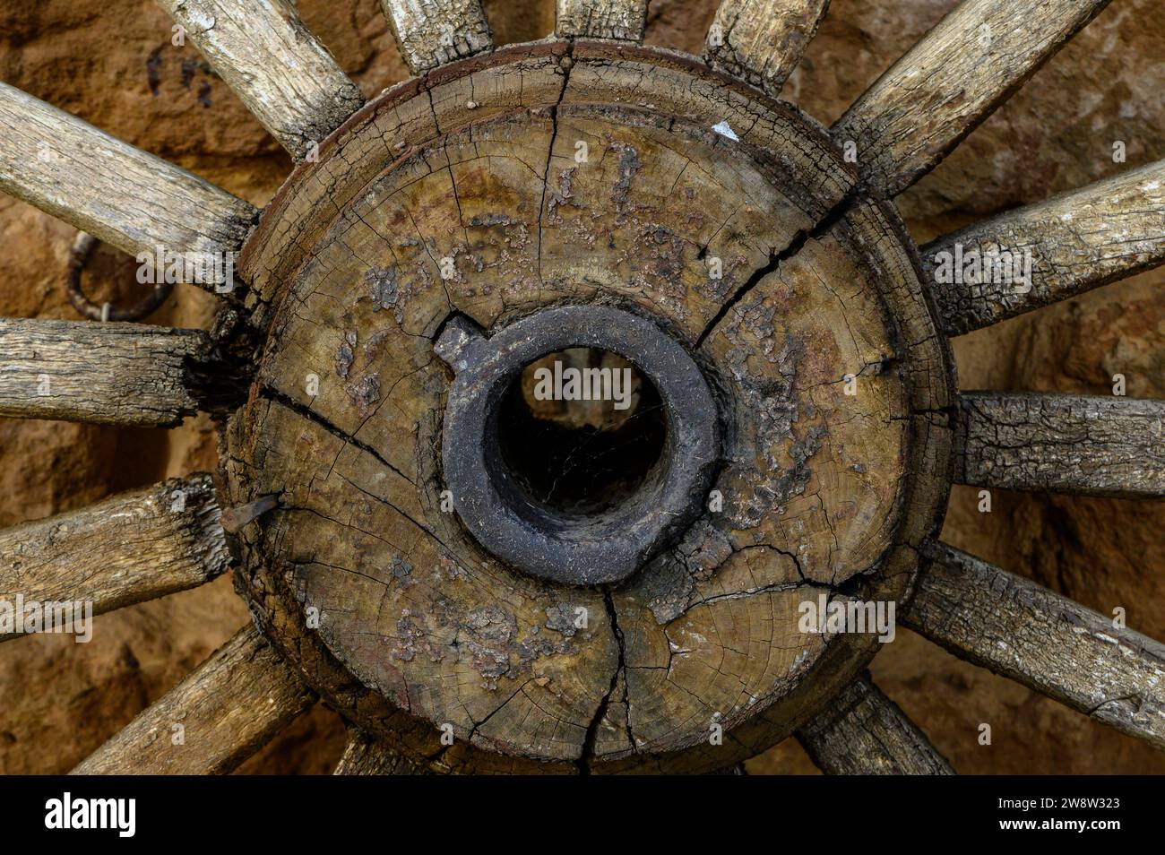Front view of axle of an old wooden cart wheel, unused, souvenir of old ...