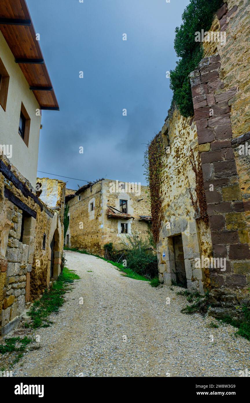 "Close-up of an unpaved street in a Burgos village, Tamayo, in ruins ...