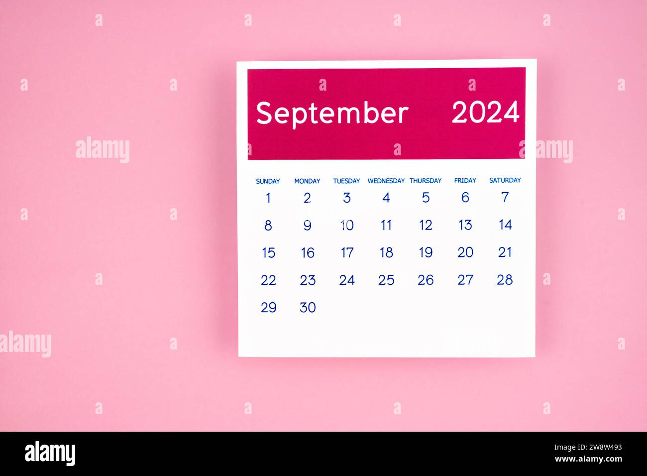 calendar page September 2024 on pink color background Stock Photo - Alamy