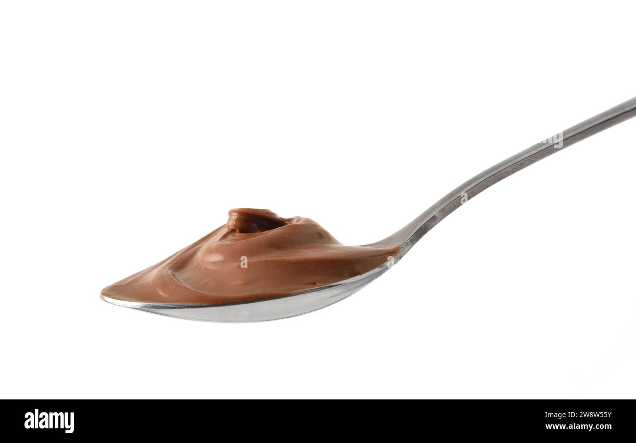Detail of metal spoon of cocoa cream isolated with white background ...
