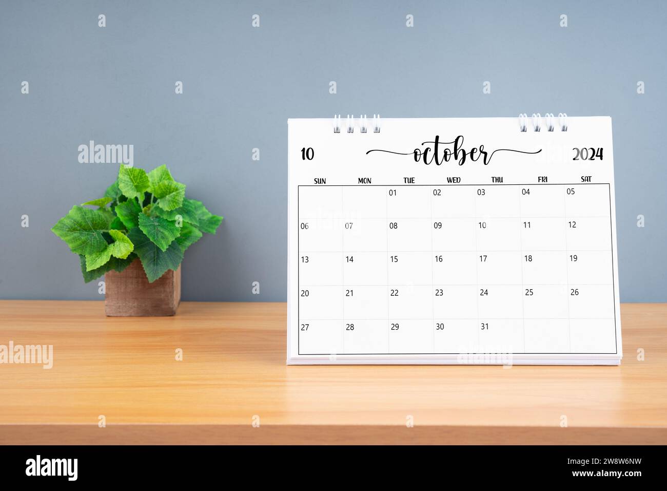 October 2024, Monthly desk calendar for 2024 year on wooden table Stock ...