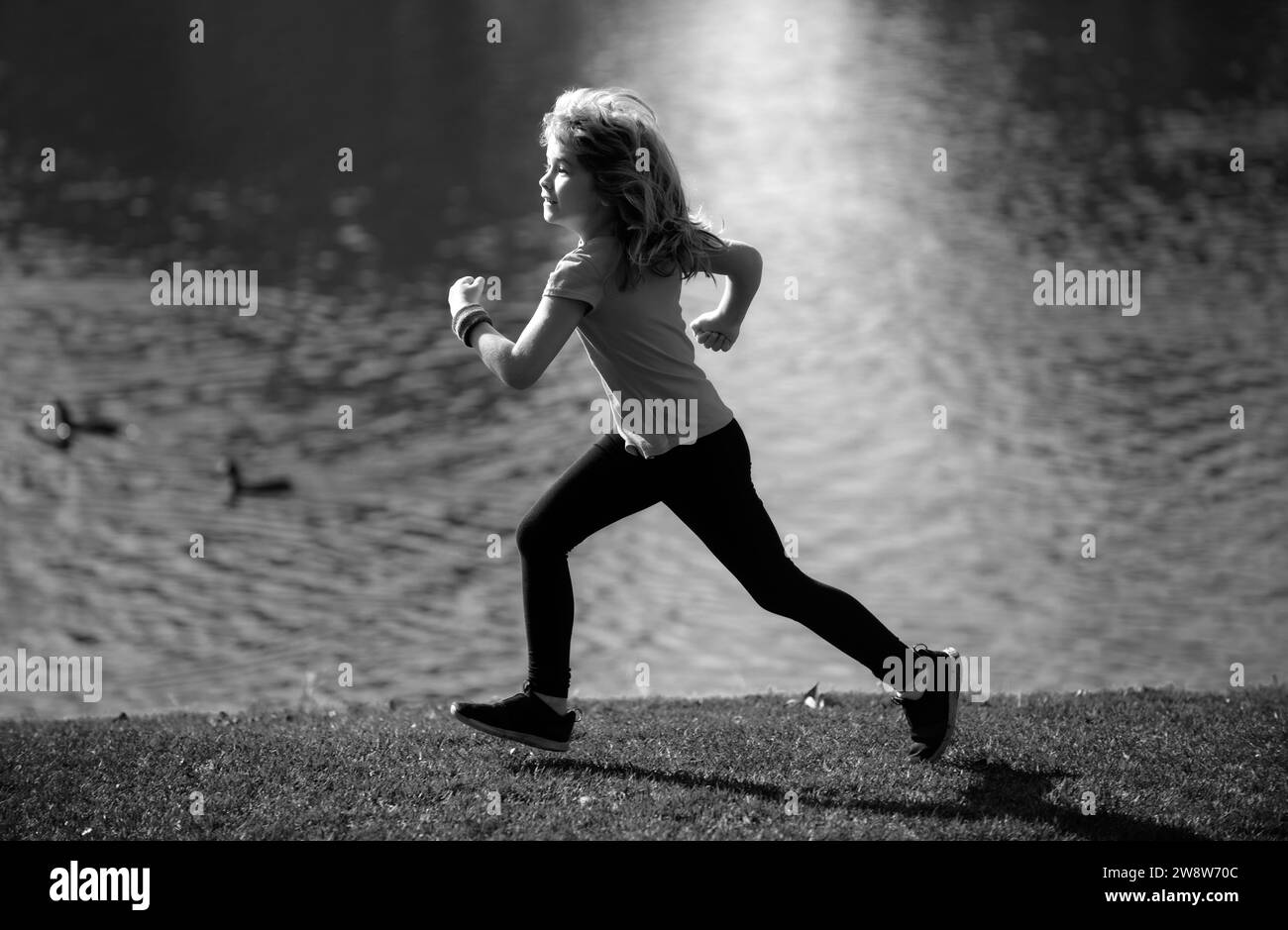 Child boy jogging in park outdoor. Sporty kid running in nature. Active ...