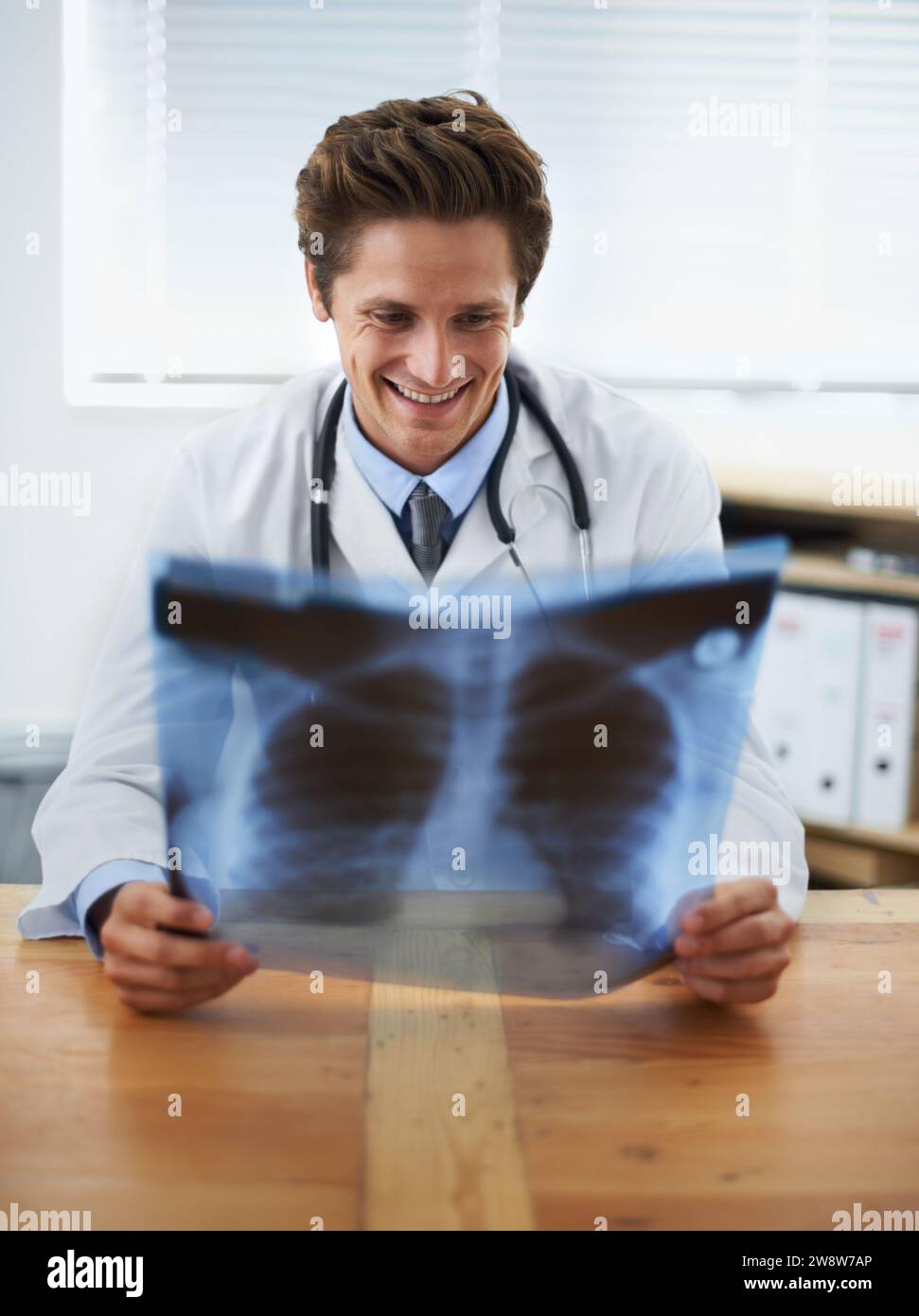 Man doctor in office, check xray and health, medical diagnosis and ...
