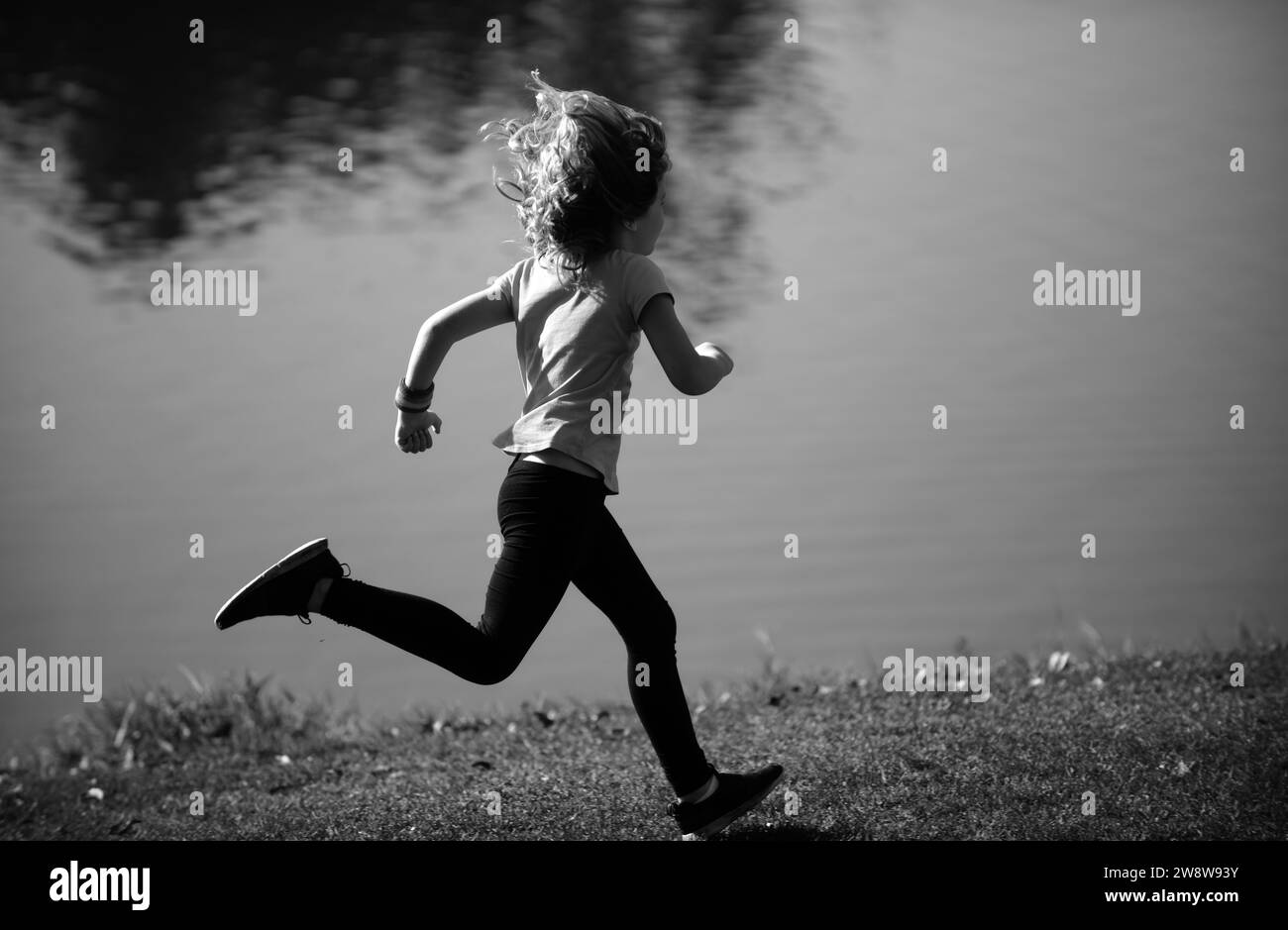 Boy sprinting Black and White Stock Photos & Images - Alamy