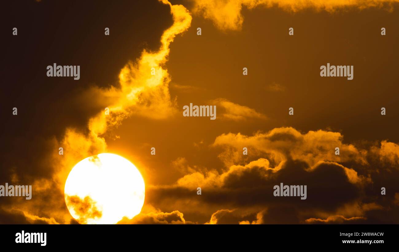 Beautiful nature morning with orange, yellow sunshine and fluffy clouds ...