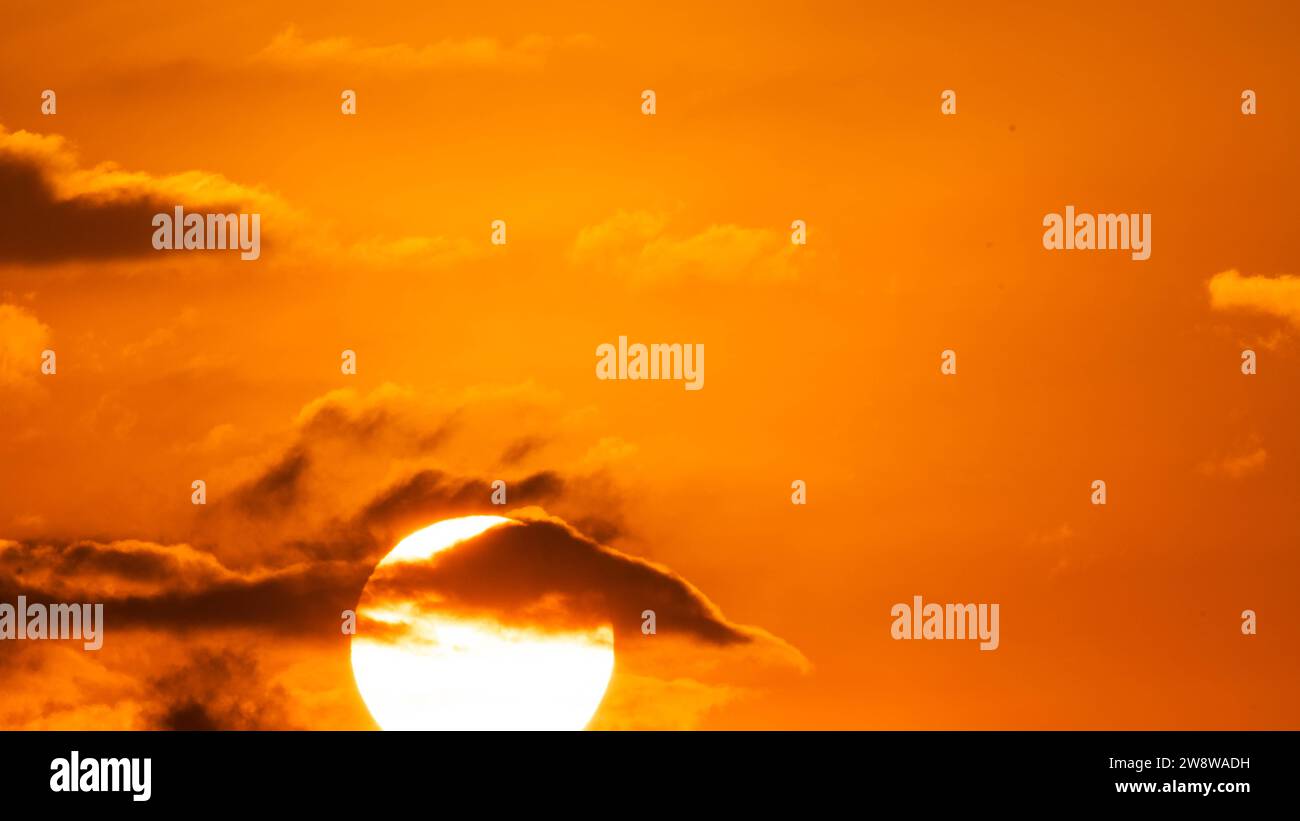 Beautiful nature morning with orange, yellow sunshine and fluffy clouds ...