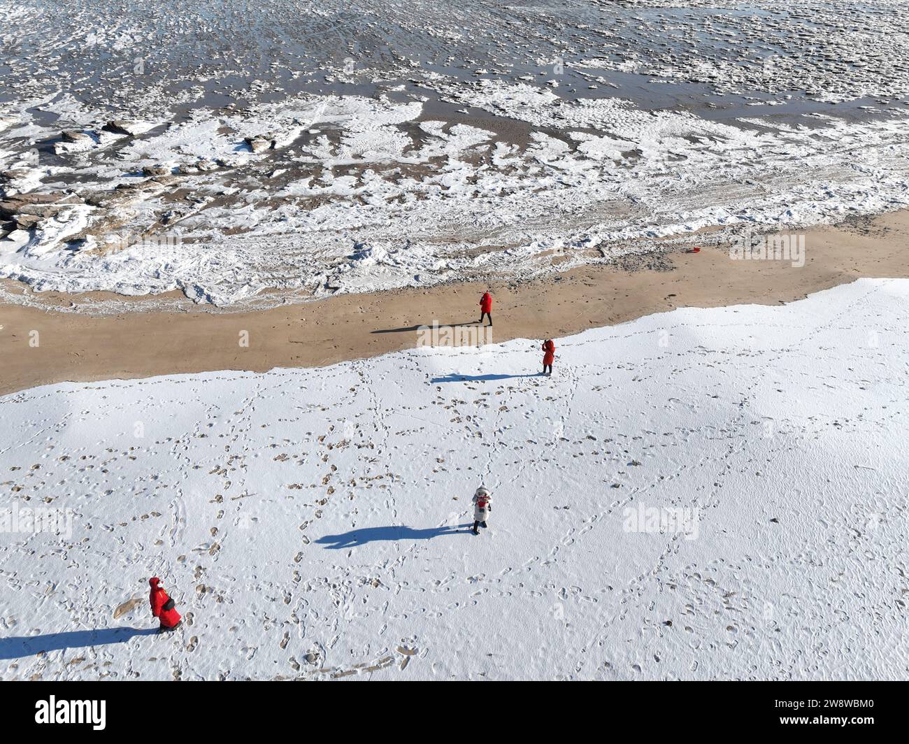 LIANYUNGANG, CHINA - DECEMBER 22, 2023 - Visitors view the ice at the ...