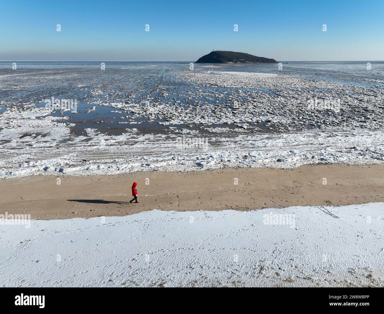 LIANYUNGANG, CHINA - DECEMBER 22, 2023 - Visitors view the ice at the ...