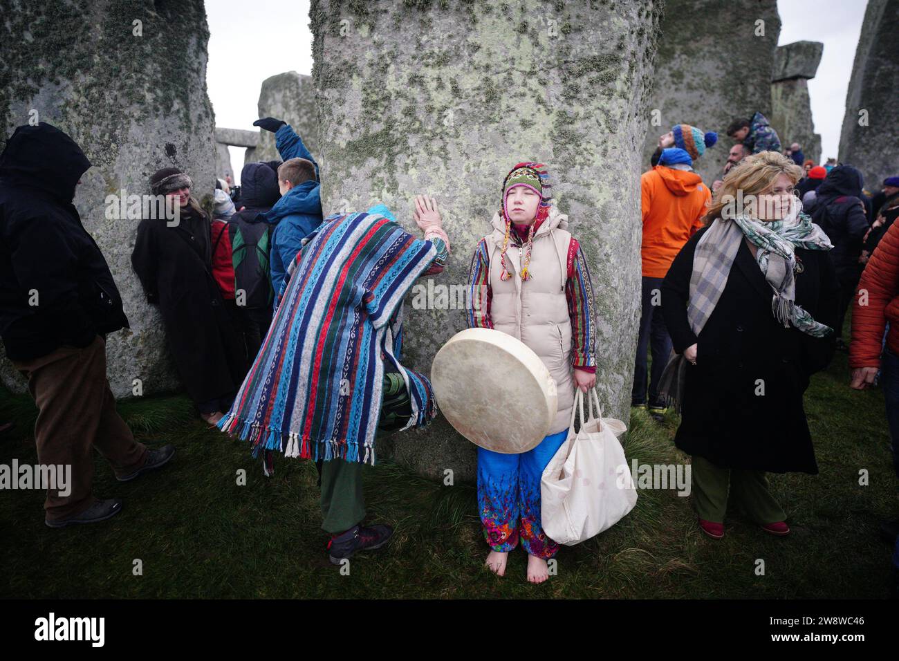 People take part in the winter solstice celebrations at the Stonehenge ...