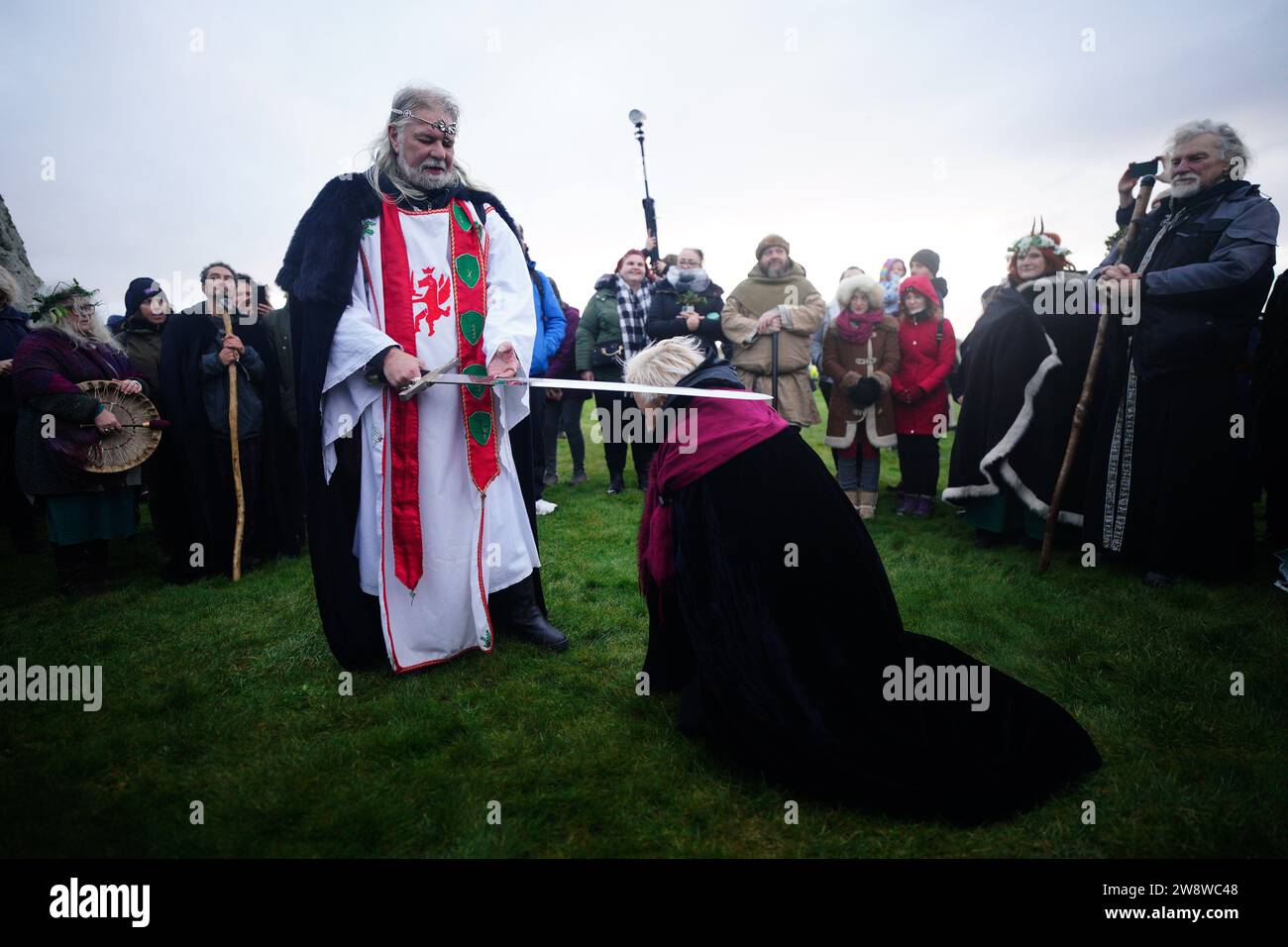 People take part in the winter solstice celebrations at the Stonehenge ...