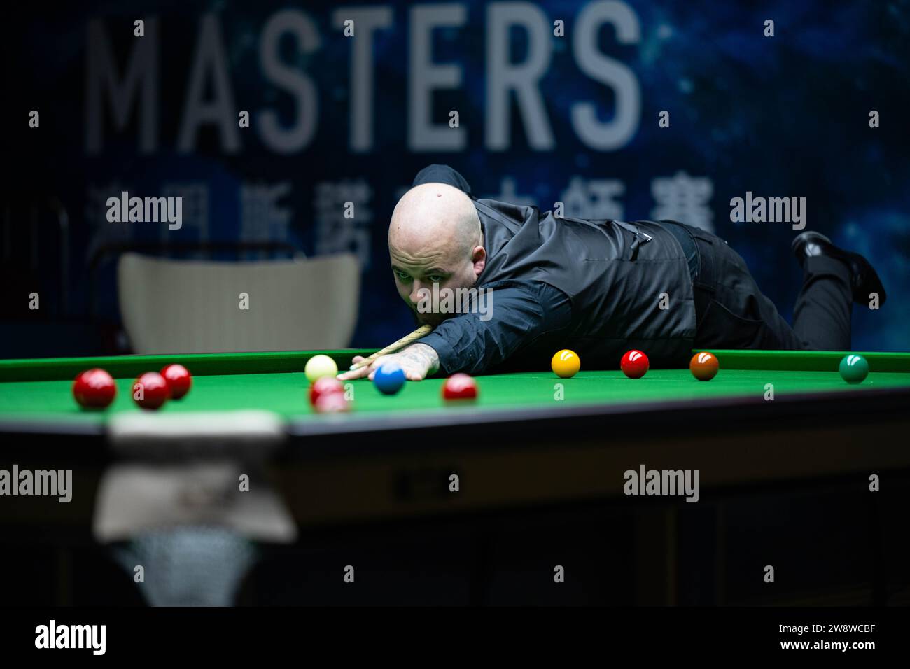 Macao, China. 22nd Dec, 2023. Luca Brecel competes during the Group A ...
