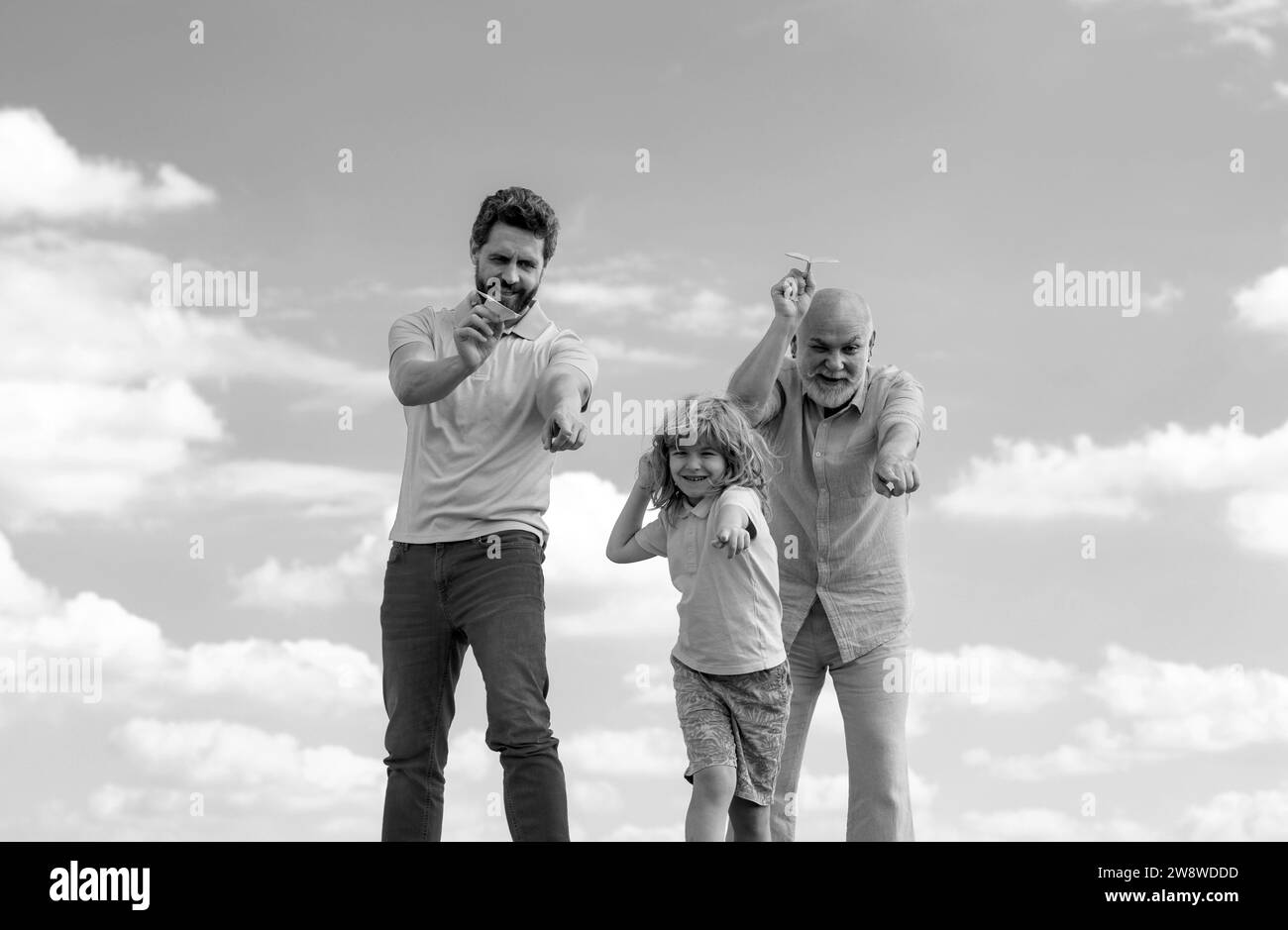 Generations of men together, portrait of smiling son, father and ...