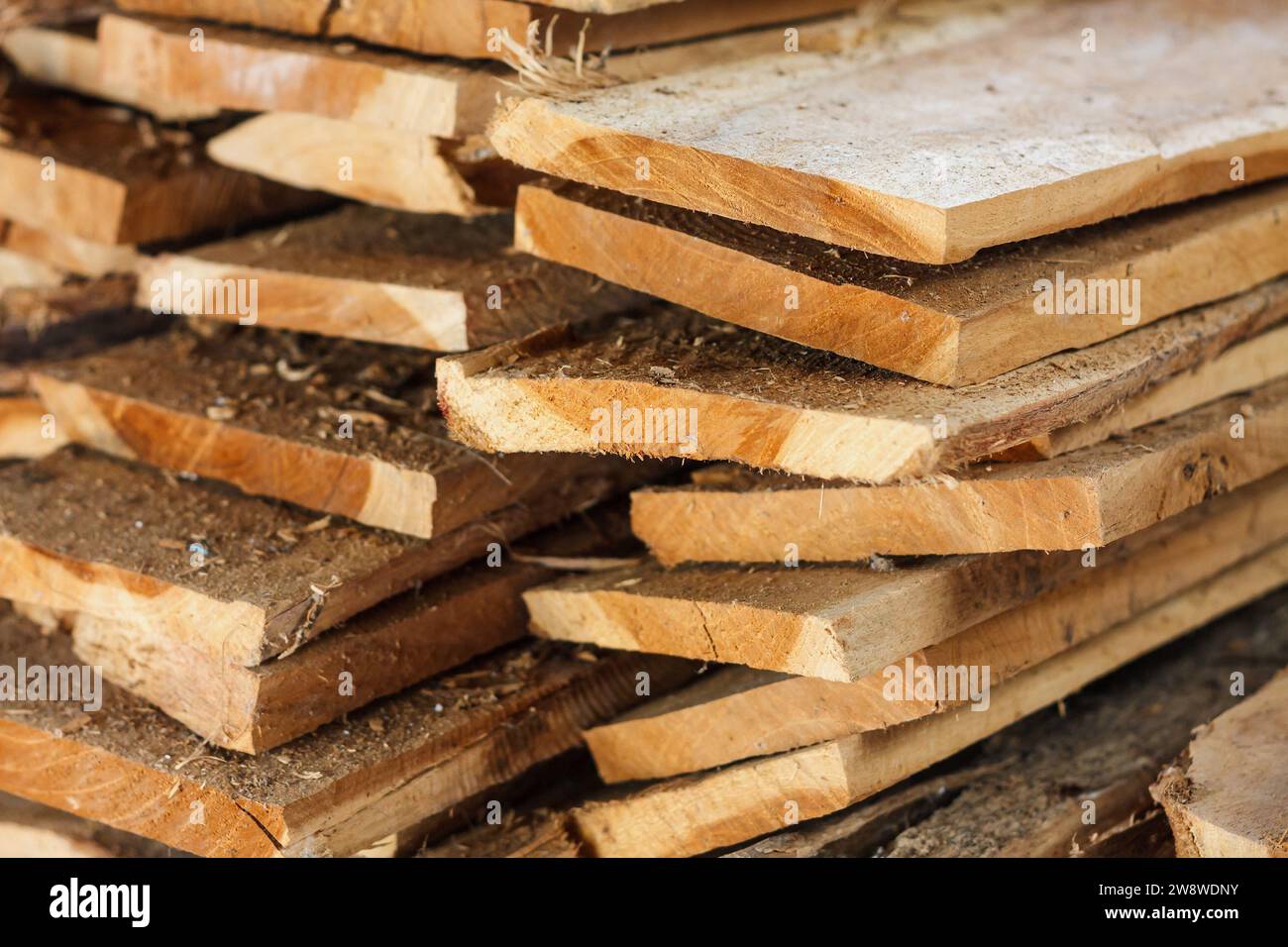 Large stack of wood planks, teak wood Stock Photo - Alamy