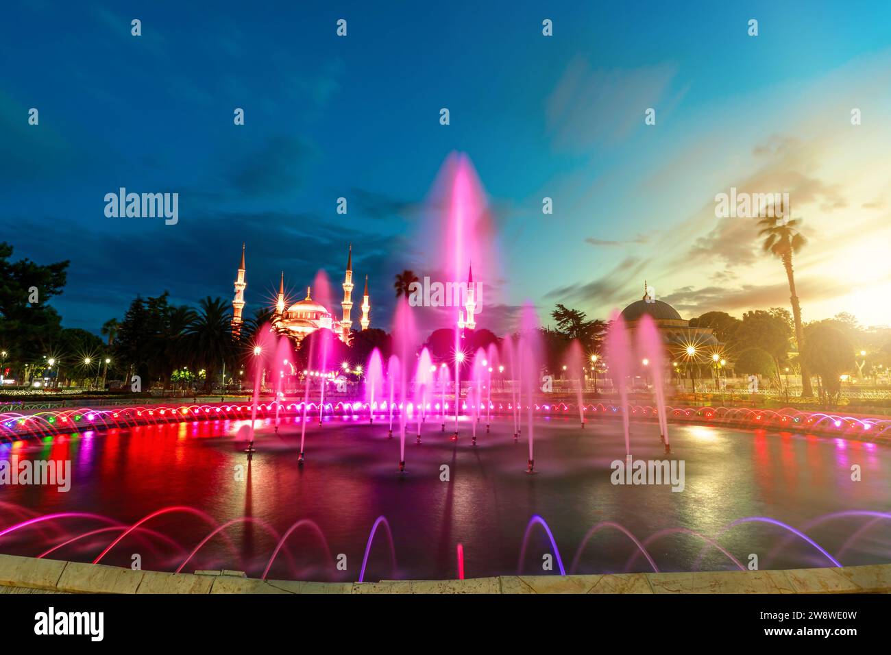 Sultan Ahmet Park square with fountain and Blue Mosque and Hagia Sophia ...