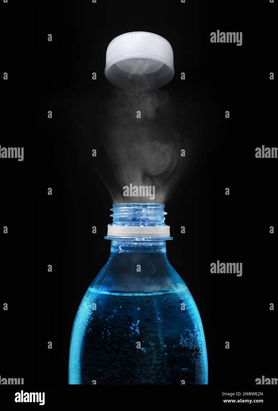 Top of open plastic bottle with carbonated mineral water in the dark Stock Photo - Alamy