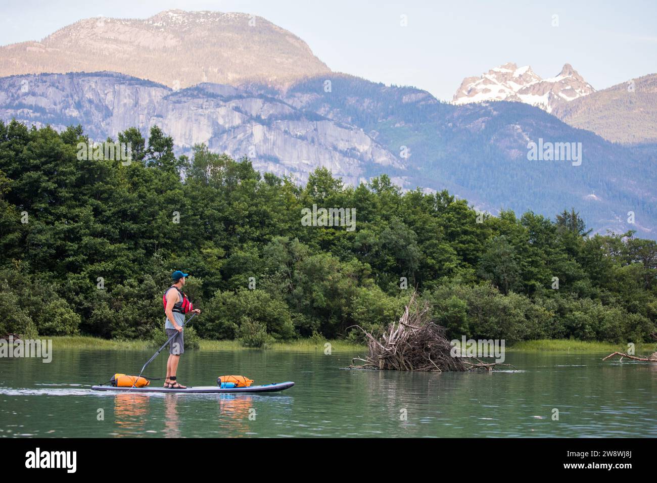 Paddle boarding the Squamish River Sky Pilot Mountain Stock Photo - Alamy