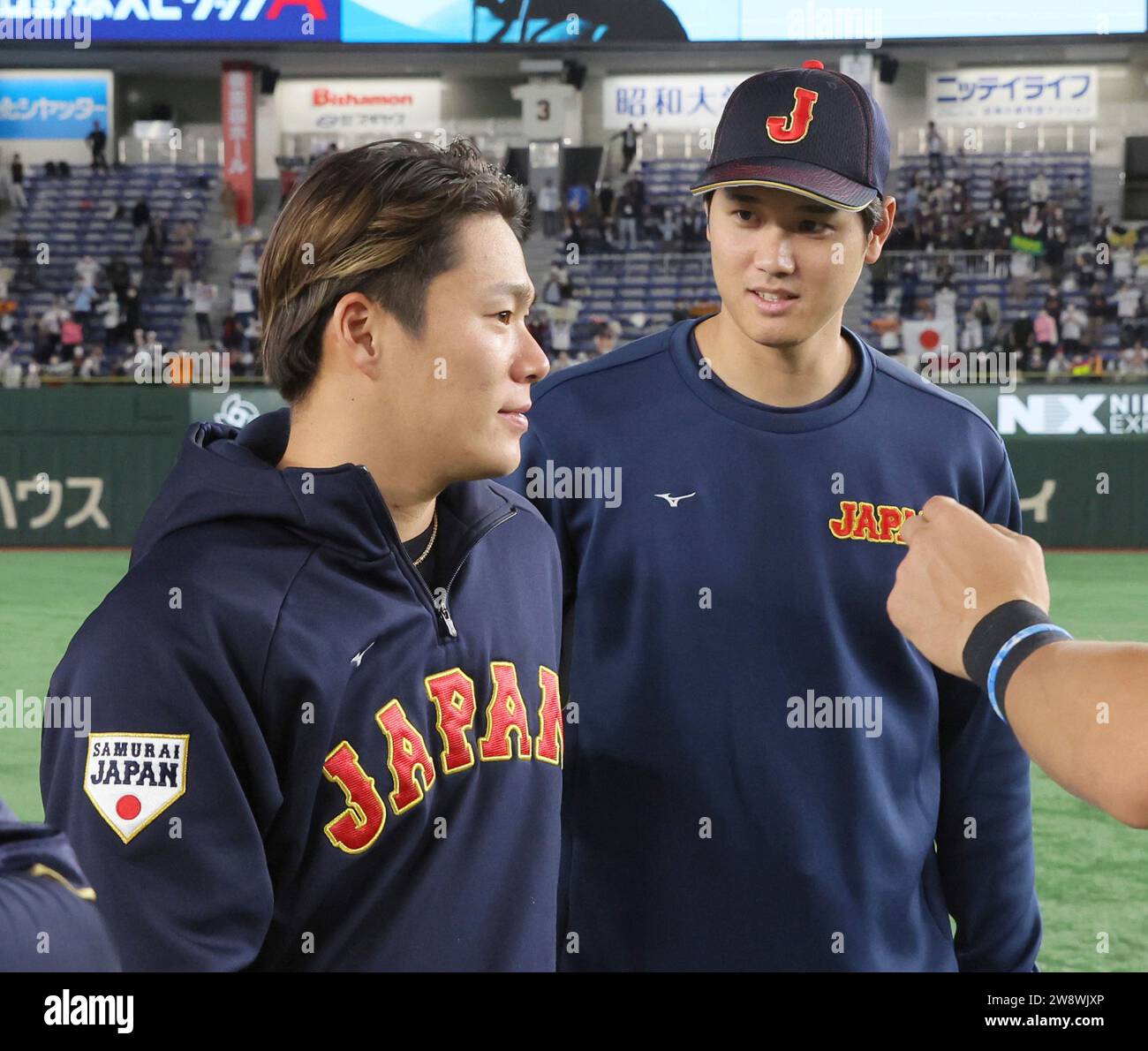 FILE: Yoshinobu Yamamoto (L) and Shohei Ohtani of Japan are seen during ...