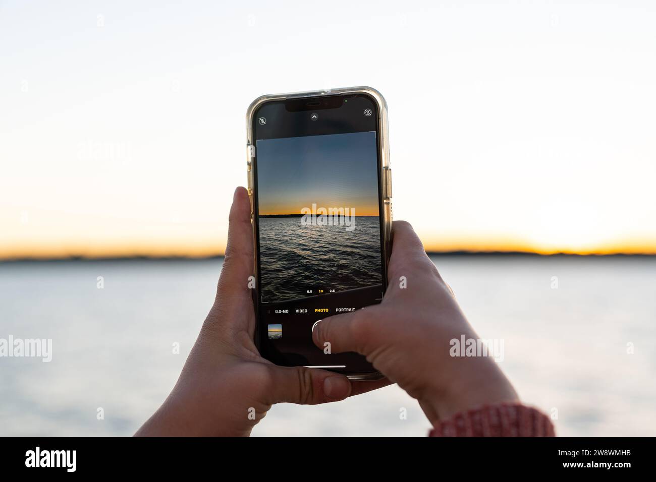 A Sunset Being Photographed With A Smartphone Stock Photo - Alamy