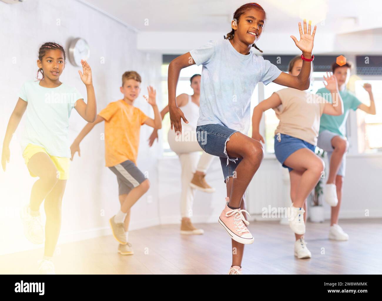 African boy dances vogue in choreographic school, friends and teacher ...