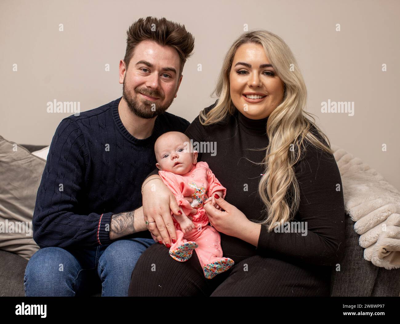 Marcus and Rachel Gilmore with their daughter Raina at their home ...