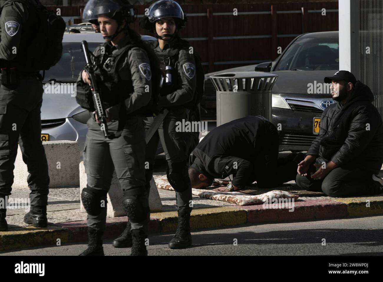 Palestinian Muslim worshipers who were prevented from entering the Al ...