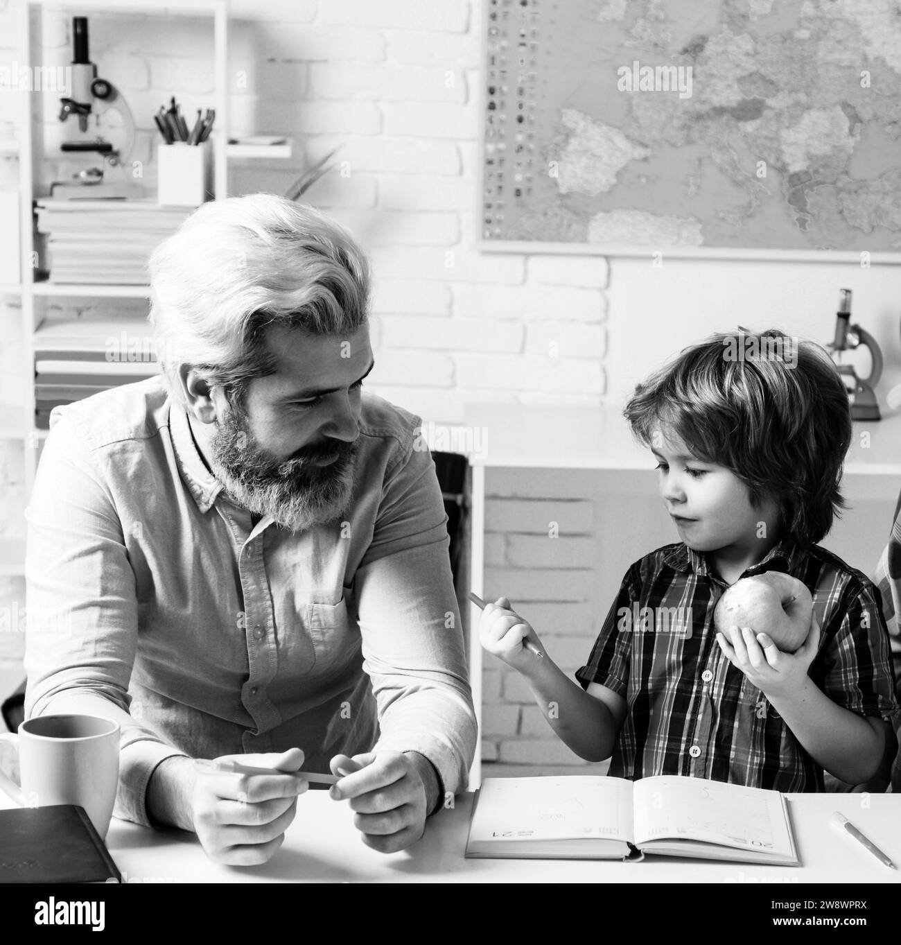 Teaching children to read Black and White Stock Photos & Images - Alamy