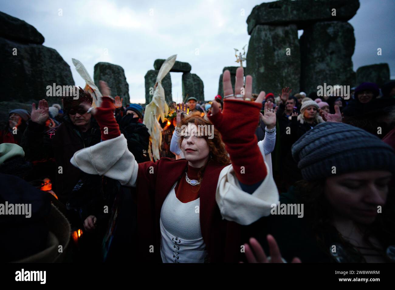 People take part in the winter solstice celebrations at the Stonehenge ...