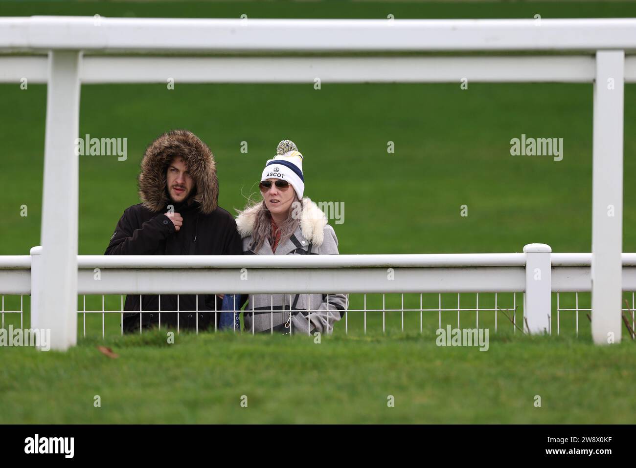 Race goers watch the action on day one of the Howden Christmas Racing ...