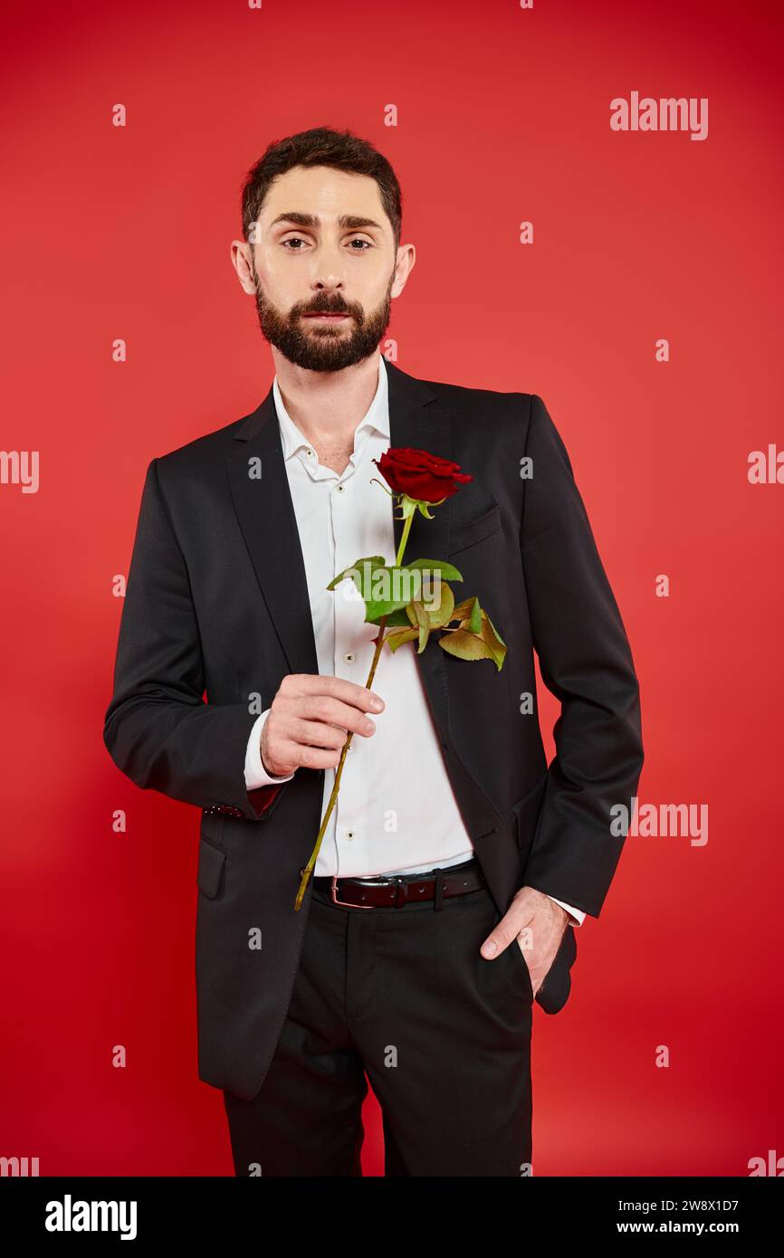 Man red rose in hand hi-res stock photography and images - Alamy