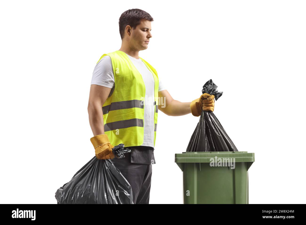 Waste collector taking a bag from a bin isolated on white background ...