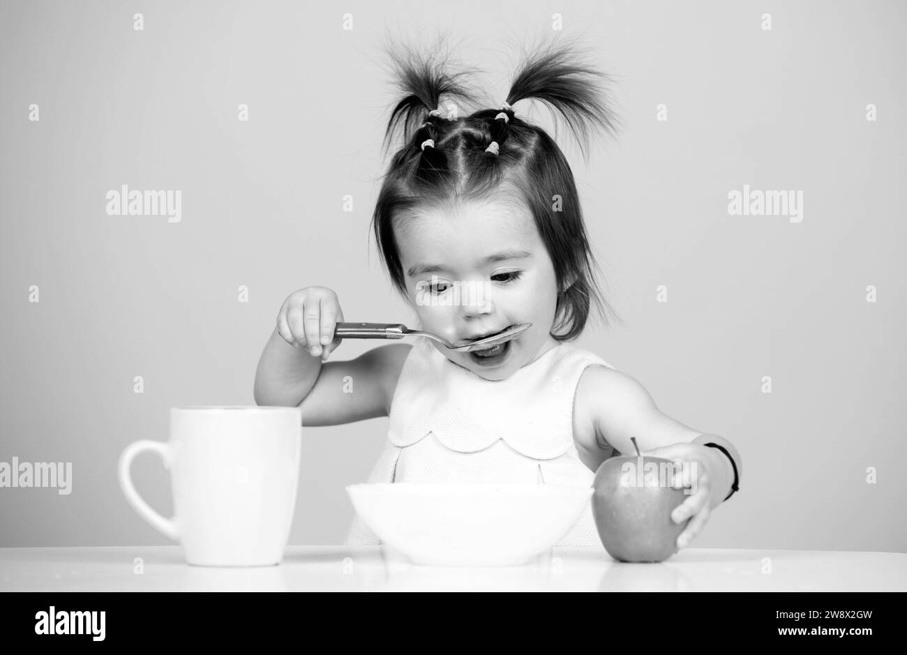 Cute baby child eat food, babies eating. Kid eating healthy food with a ...