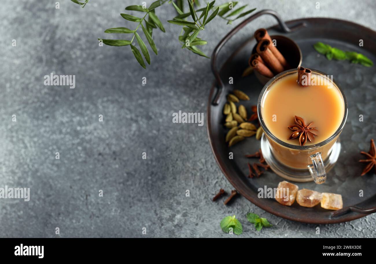 traditional masala tea with spices and milk Stock Photo - Alamy
