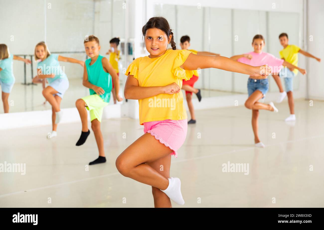 Active children dancing modern dances in choreographic studio Stock ...