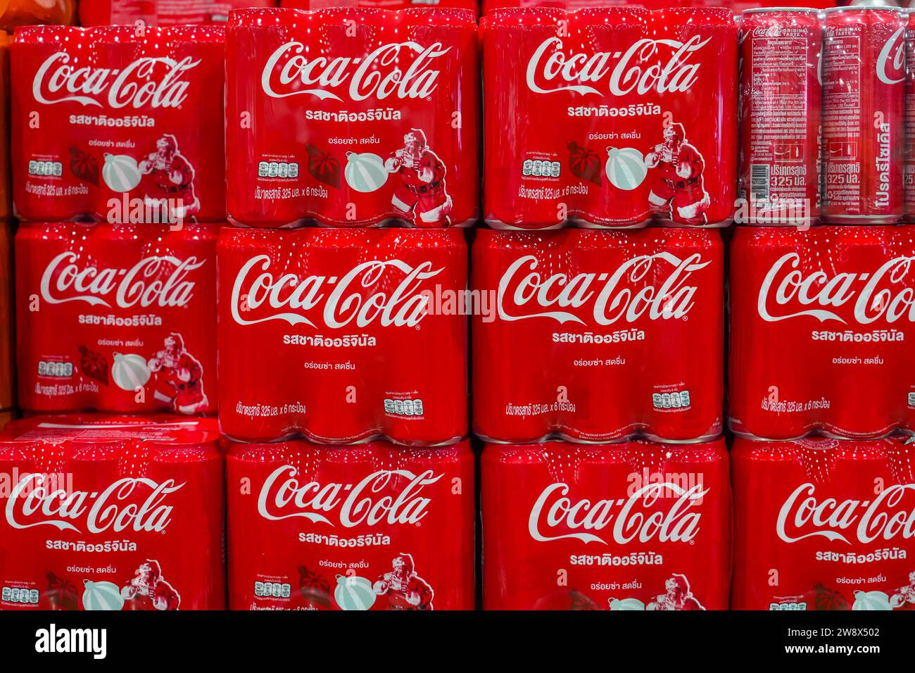 Packaging Coca-Cola aluminum cans in film on pallets for sale in retail ...