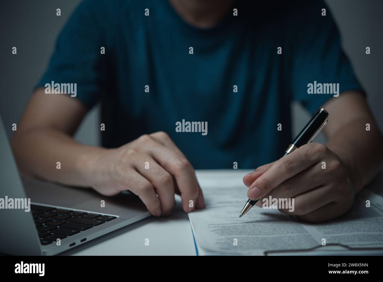 Hand holding pen write job application documents form contract, male ...