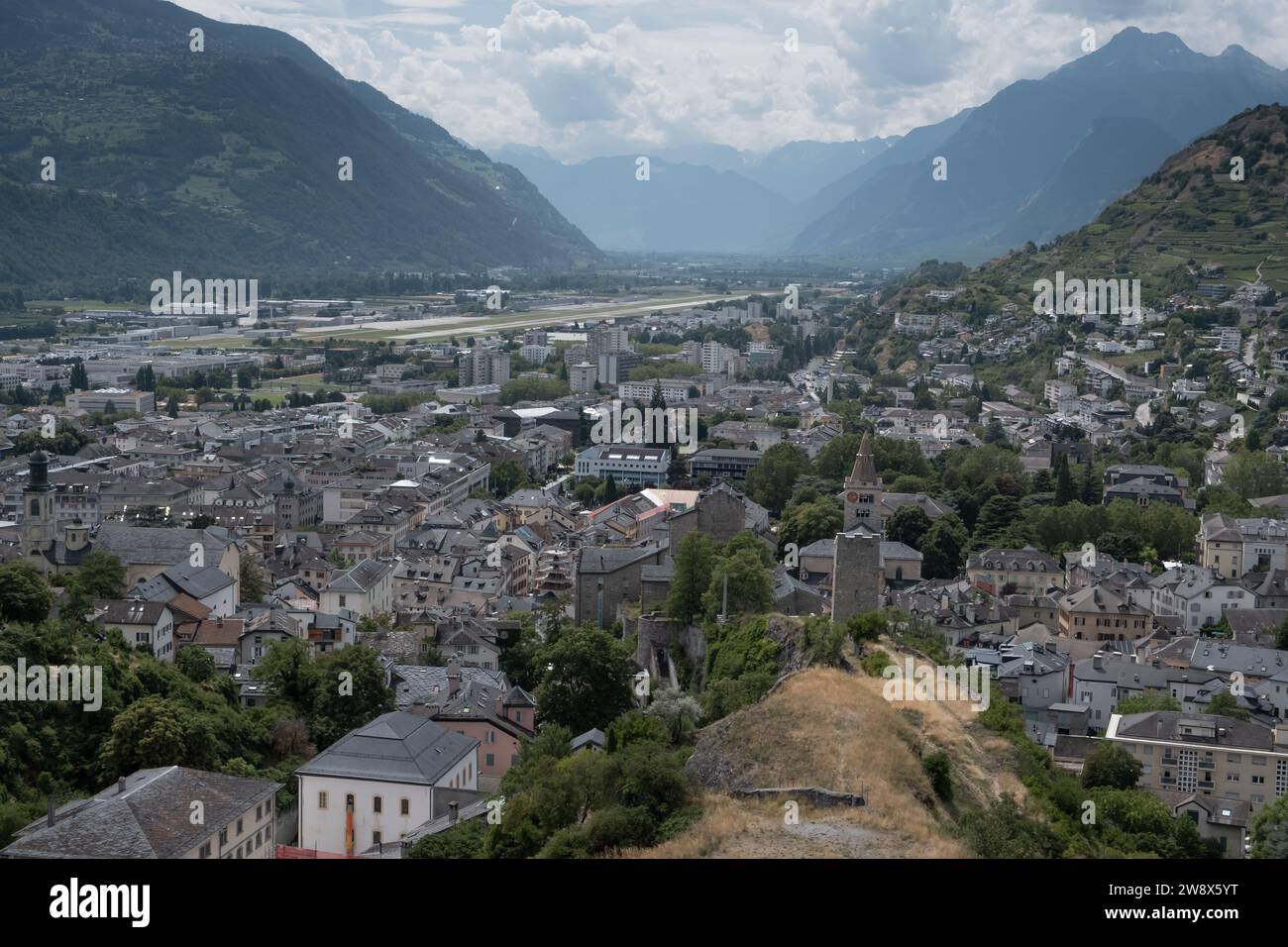 The beautiful city of Sion nestled in the mountains offers breathtaking ...