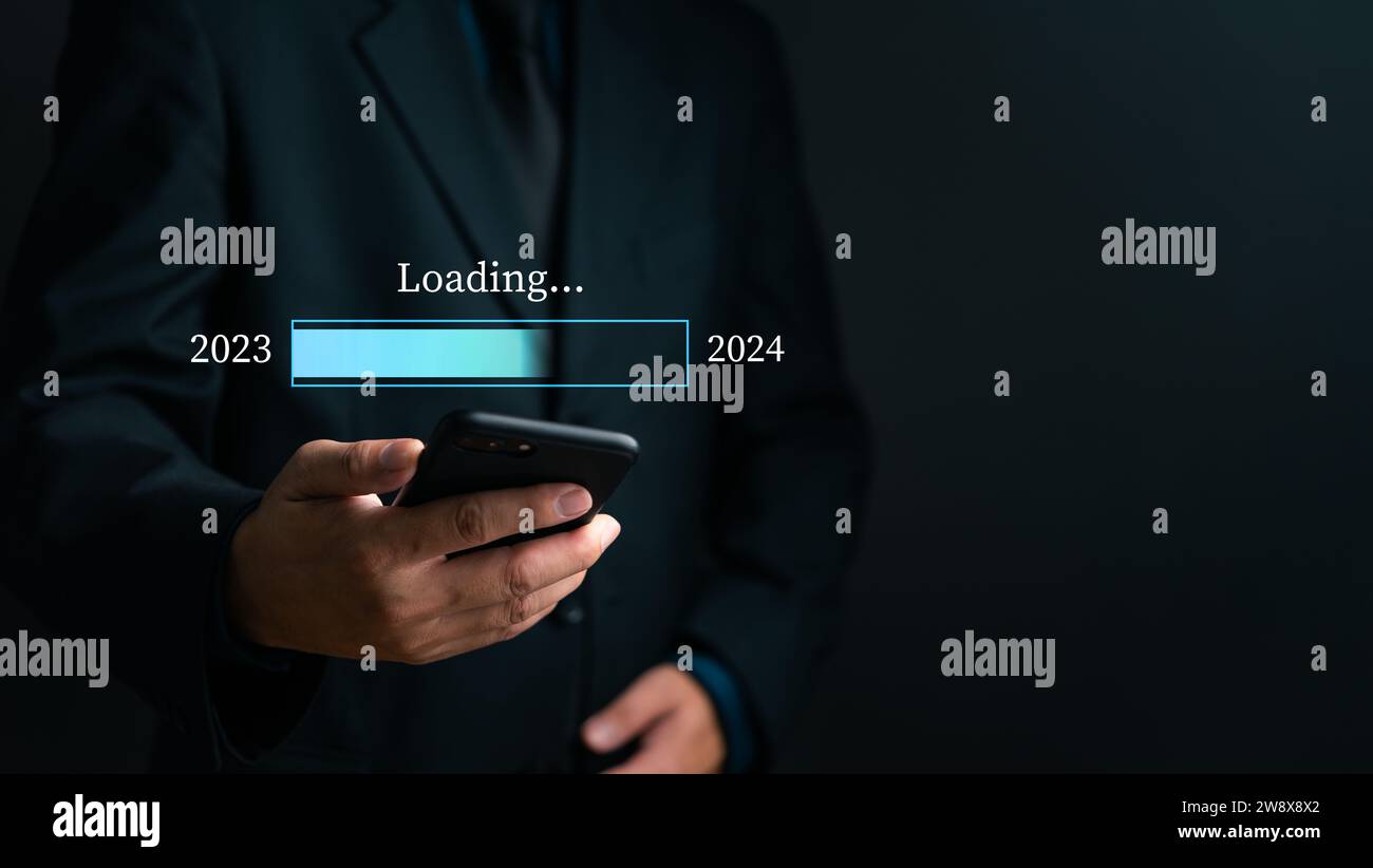 loading progress bar to 2024 Businessman using mobile phone investment ...