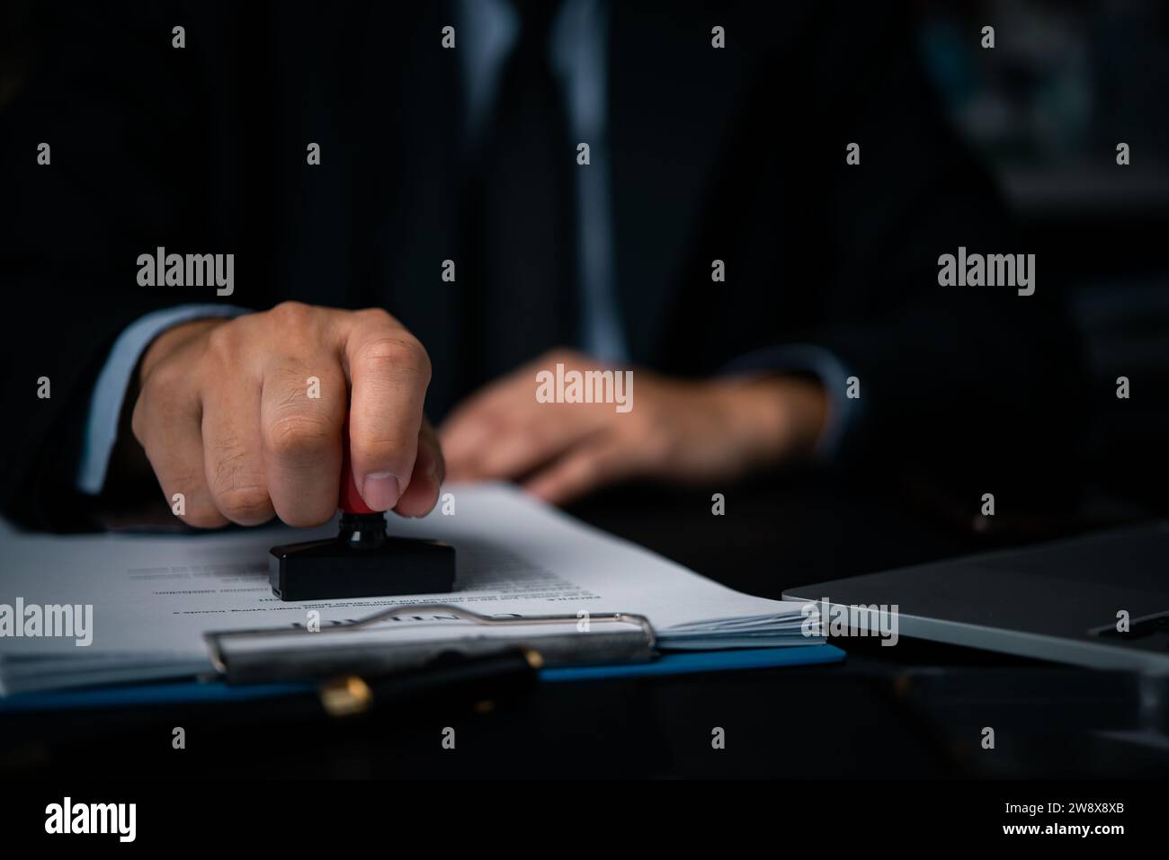 Authorized person rubber stamps contract certificates and office ...