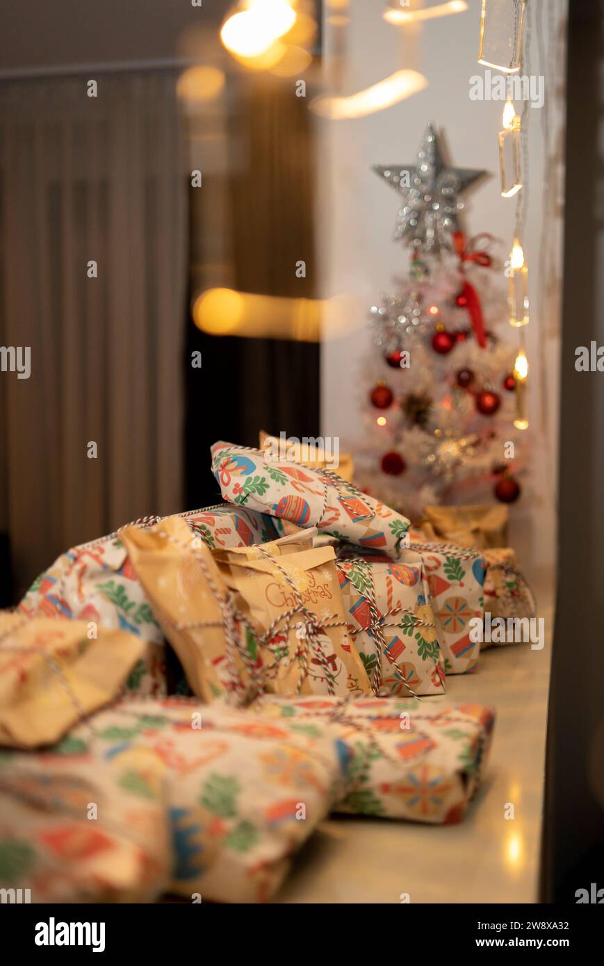 Christmas presents, tree and decorations Stock Photo - Alamy