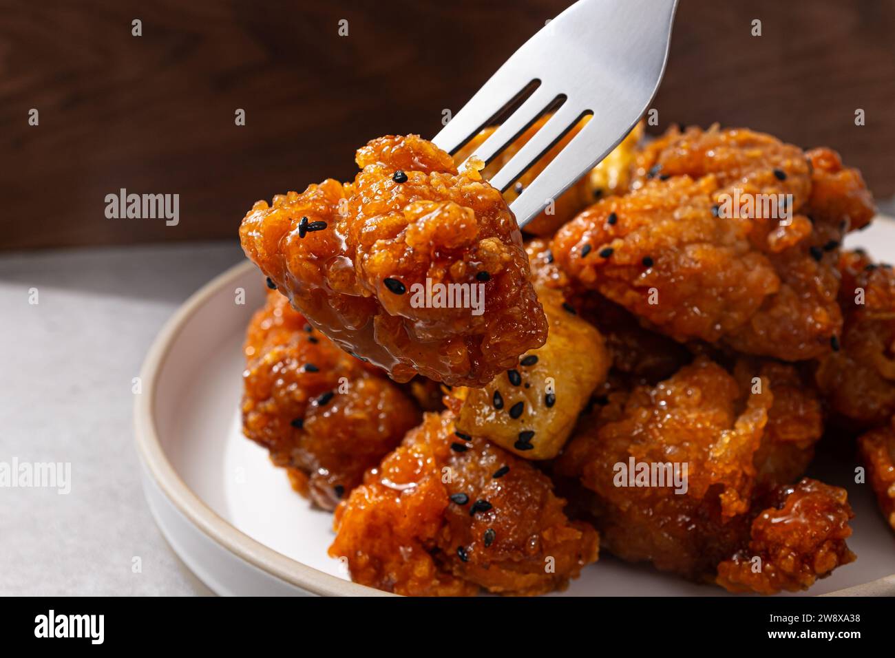 Honey Chicken Gangjeong seasoned with honey and soy sauce Stock Photo ...