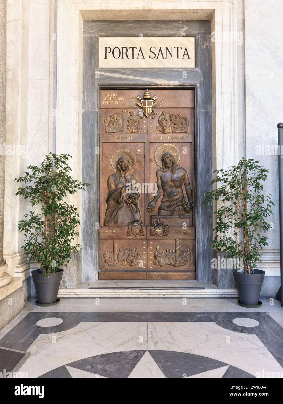Sculpture of Jesus Christ and his mother Mary on the Porta Santa ( holy ...
